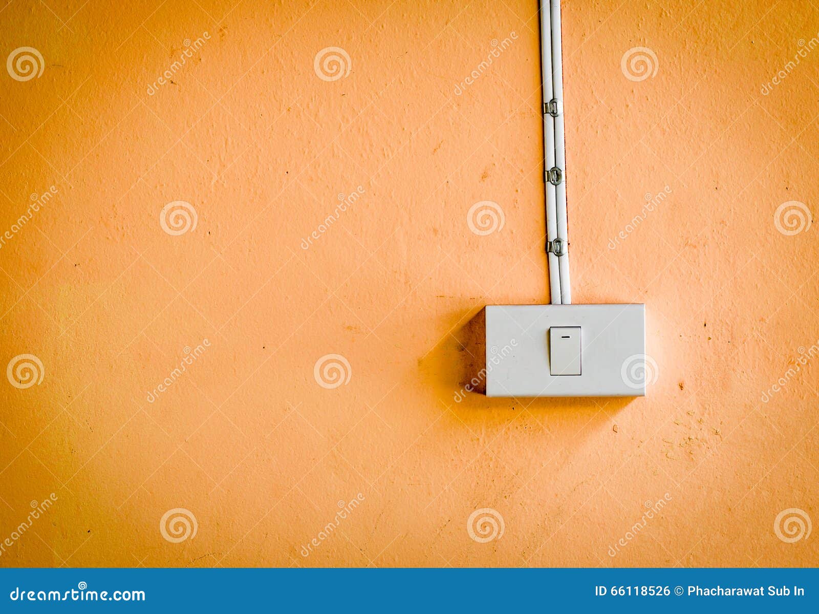Electronic Switch on Orange Color Wall Stock Photo - Image of shot ...