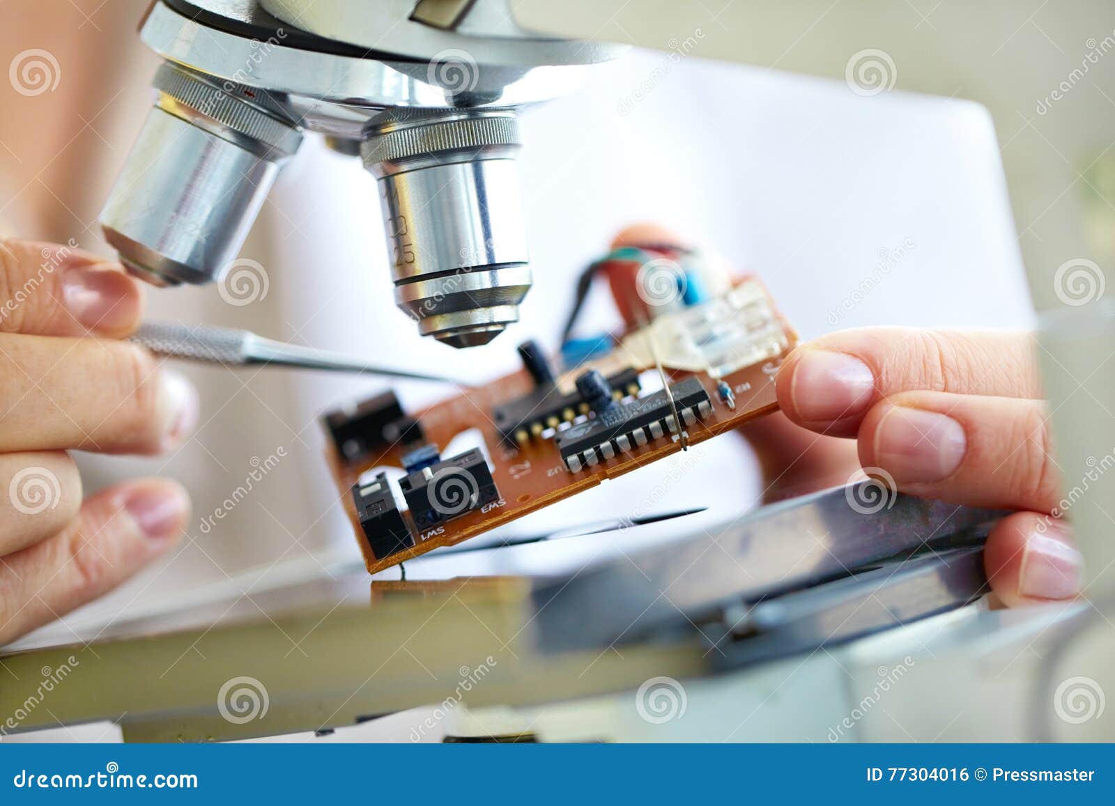 Electronic technician stock photo. Image of board, hand - 77304016