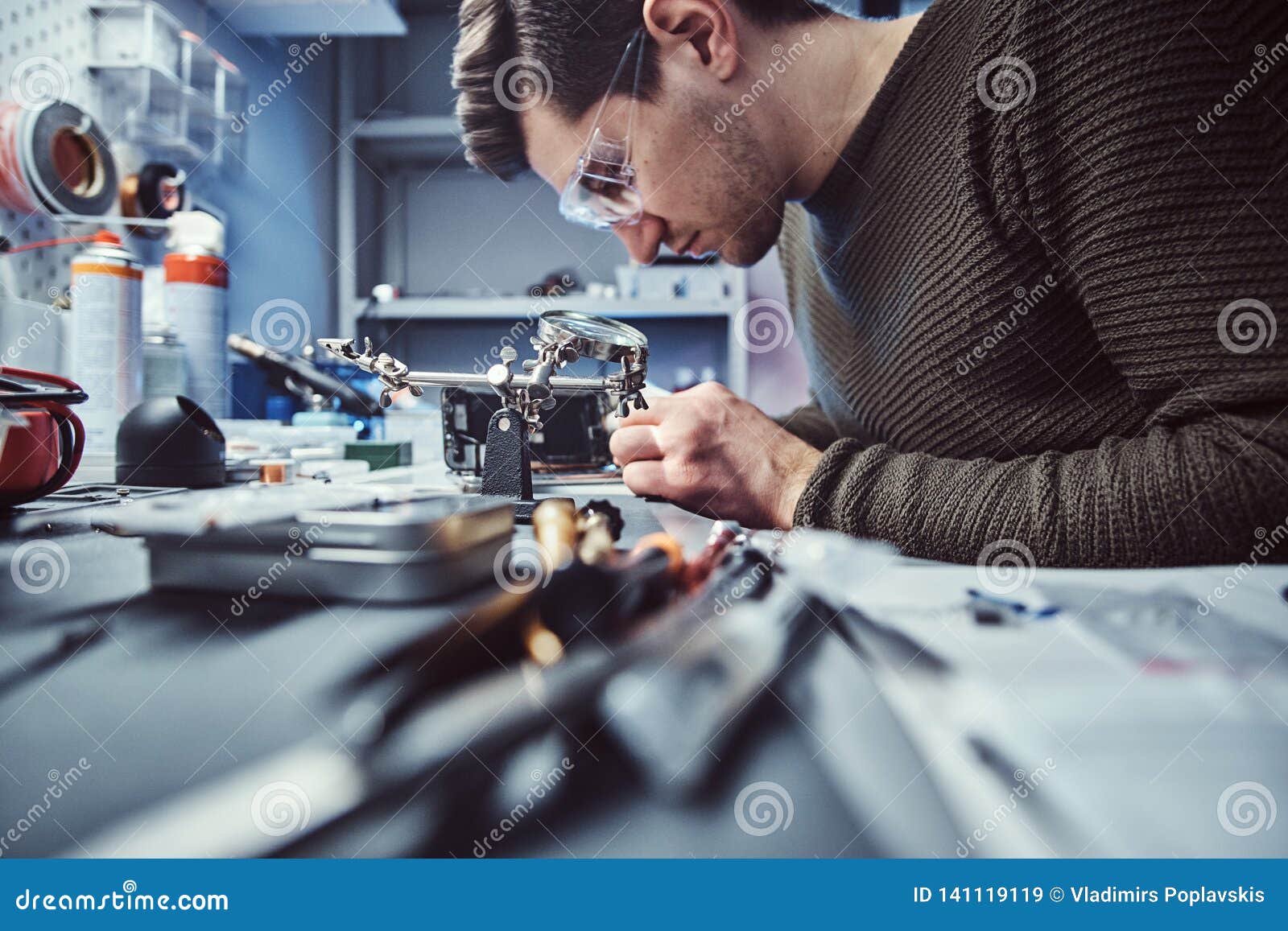 Electronic Technician Working in the Repair Shop Stock Image - Image of ...