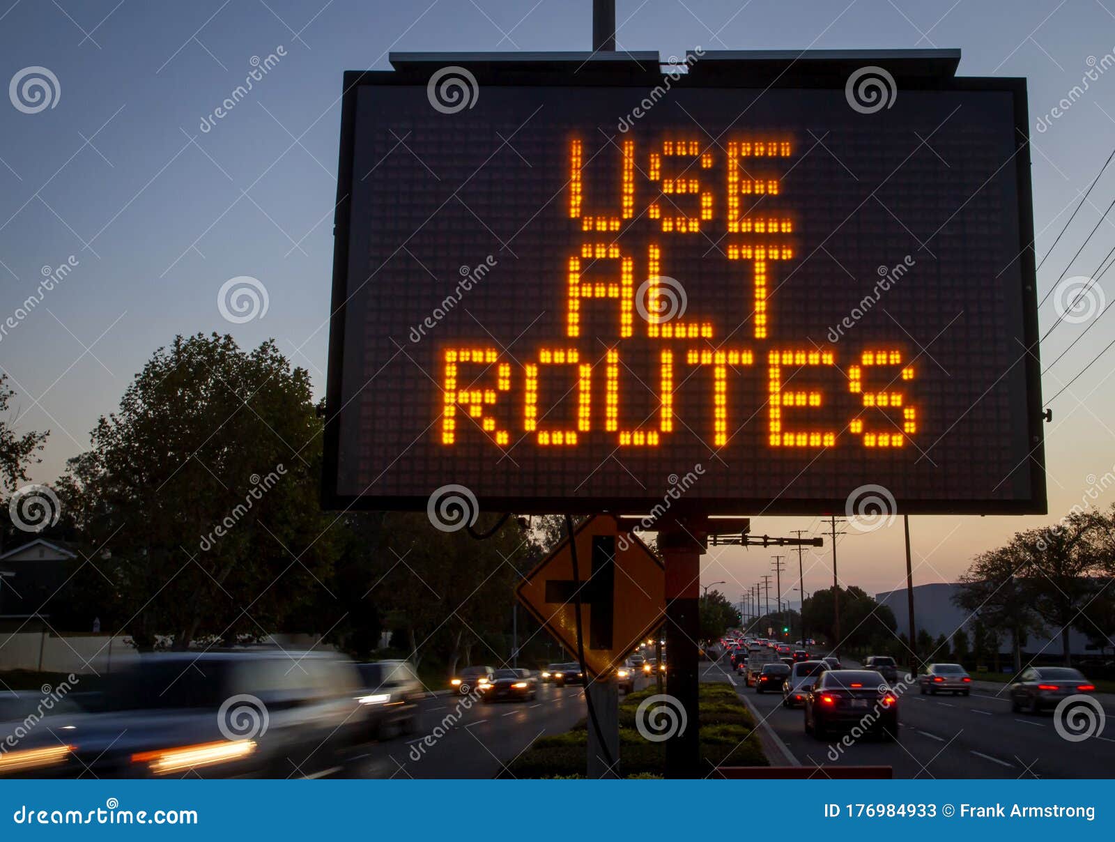 Electronic Traffic Sign Stating Use Alternate Routes with Blurred ...