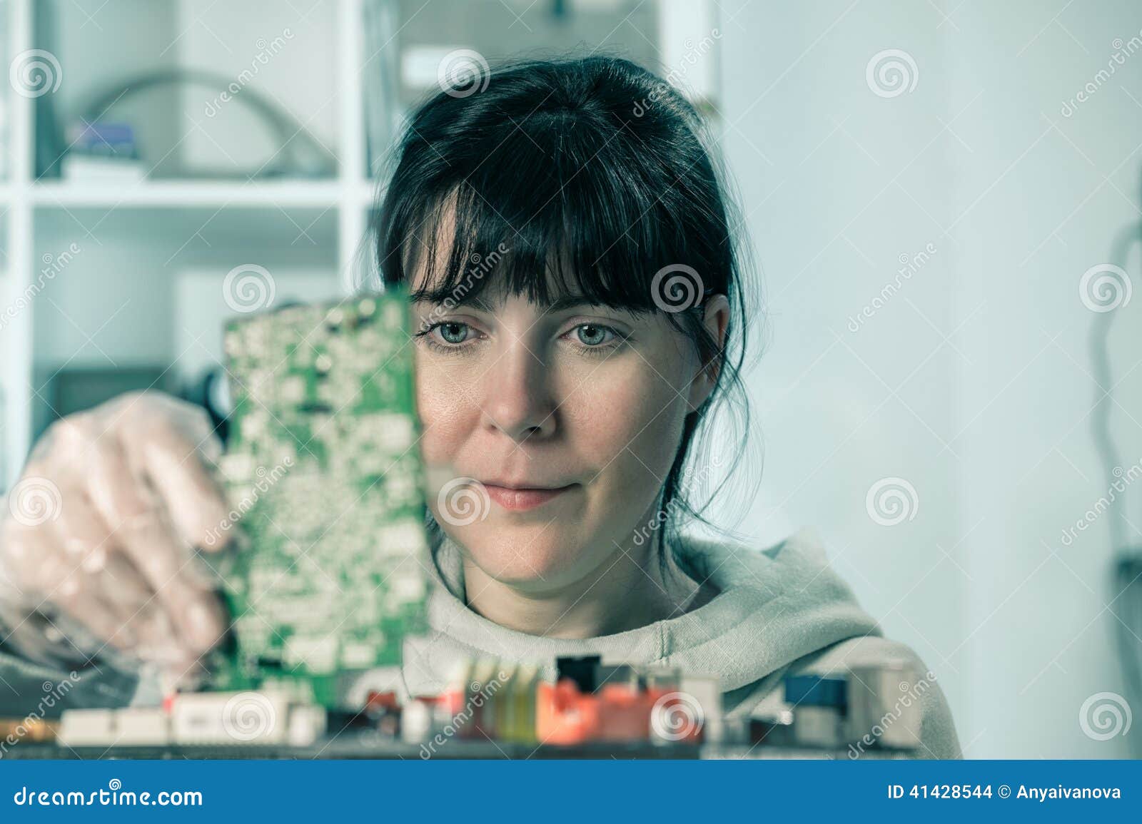 Electronics Repair Tech at Work Stock Photo - Image of center, circuit ...