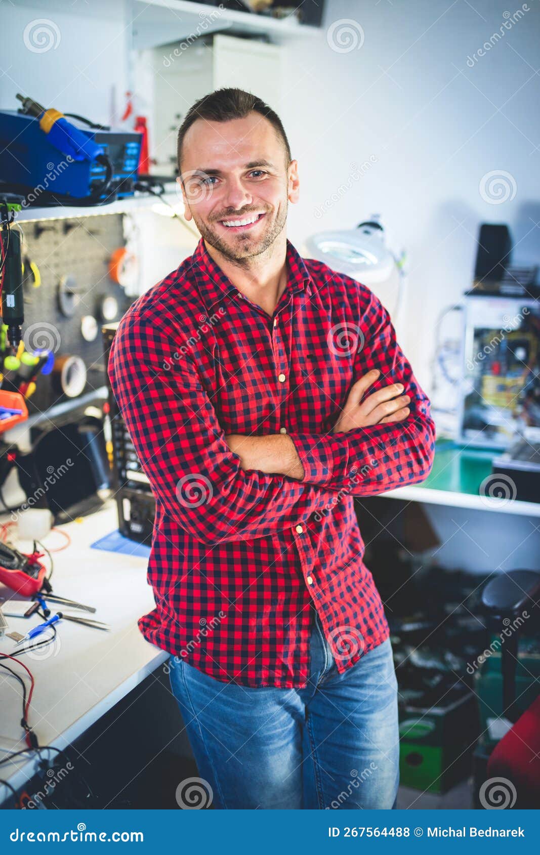Electronics Service Shop Owner at Work Repairing Computer Stock Photo ...
