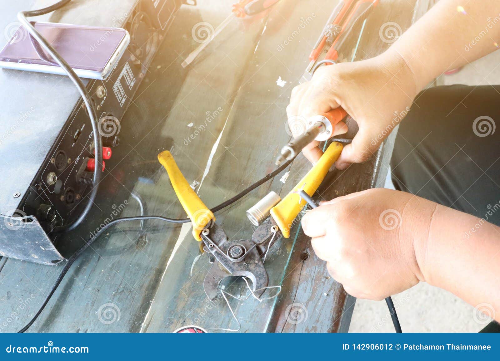 Electronics Technician Men are Repairing Electrical Appliances ...