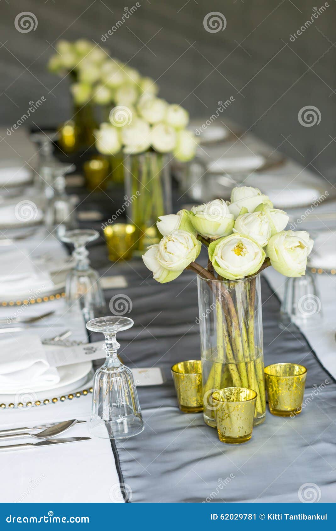 Elegance Table Set Up with Lotus Flowers Stock Image - Image of metal ...