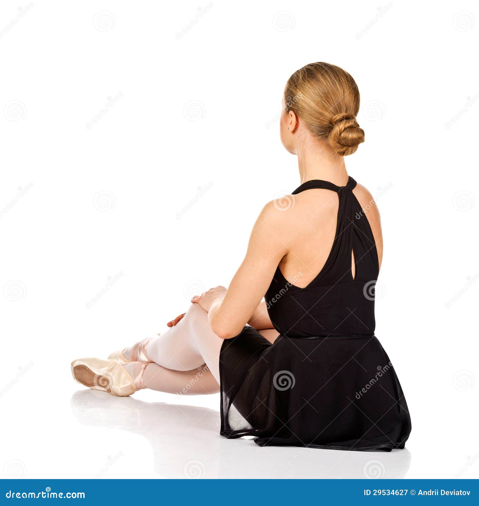 Elegant Ballet Dancer Sitting on the Floor. Rear View Stock Image ...