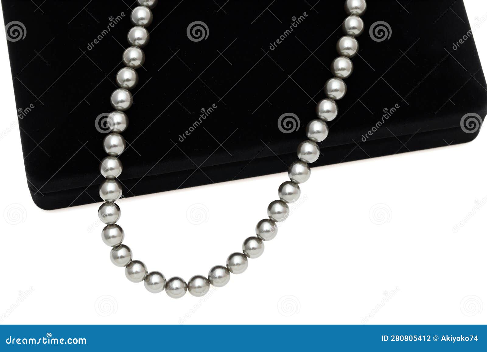 Elegant Black Pearl Necklace Stock Photo - Image of locket, silver ...