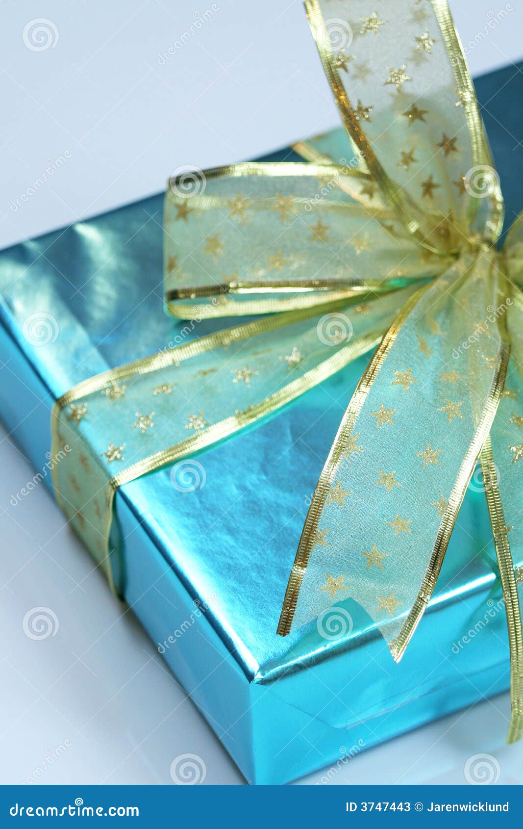 Elegant blue present stock image. Image of christmas, wrapped - 3747443