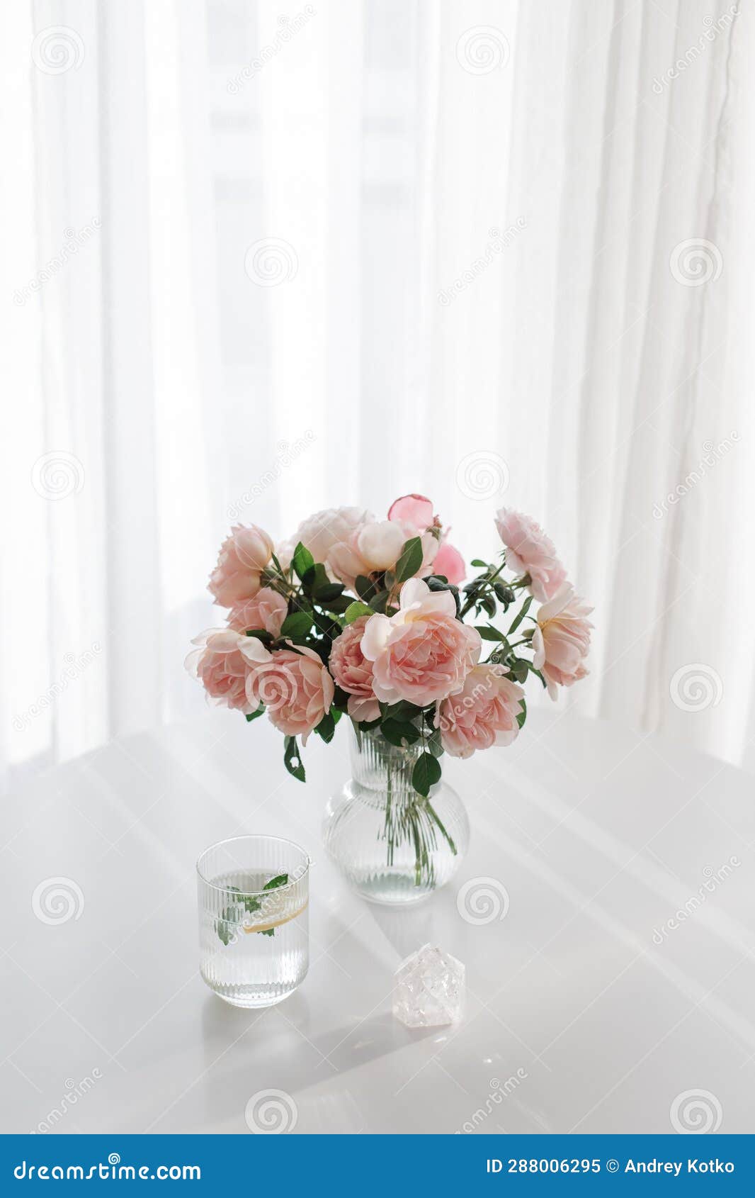 An Elegant Bouquet of Fresh Roses and Placed by a Light-filled Window ...