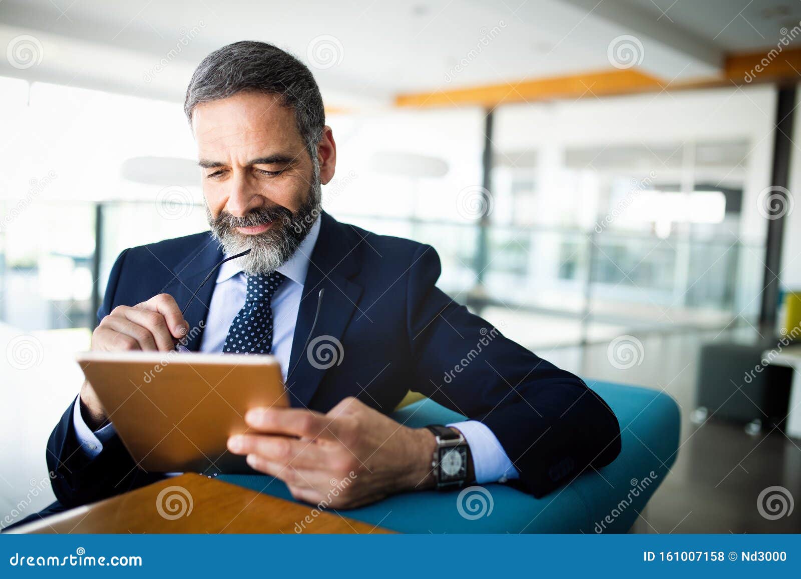 Elegant Business Multitasking Multimedia Man Using Devices Stock Photo ...