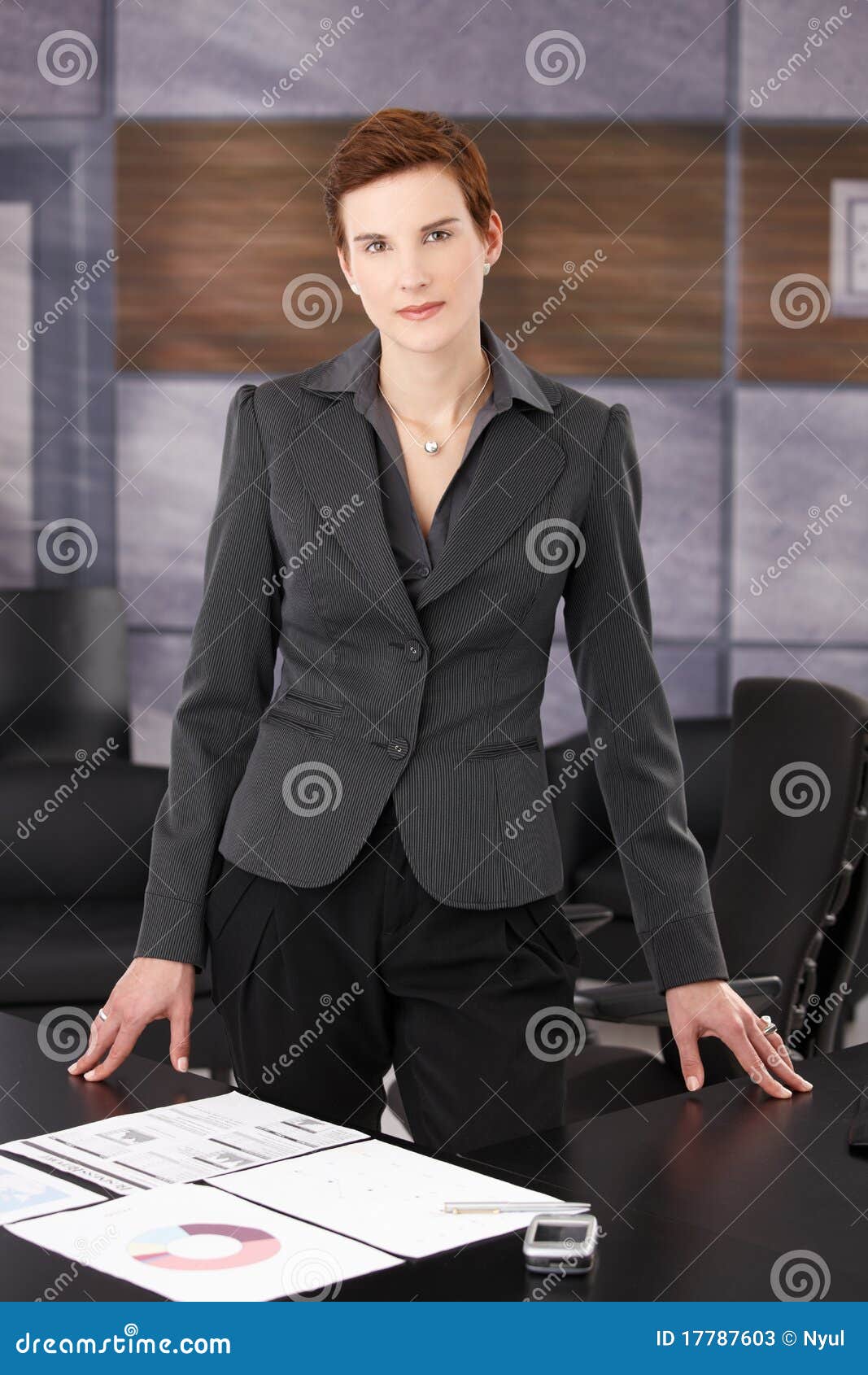 Elegant Businesswoman in Office Stock Image - Image of focusing ...