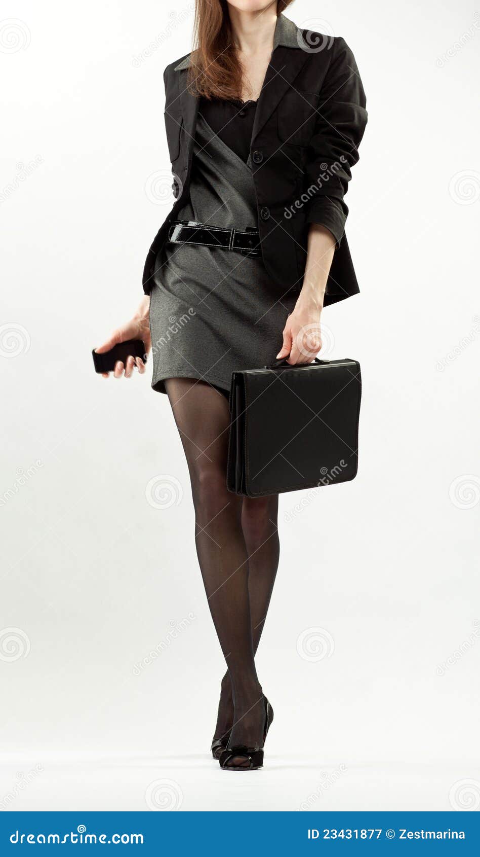 Elegant Businesswoman Walking Stock Image - Image of mobile, high: 23431877