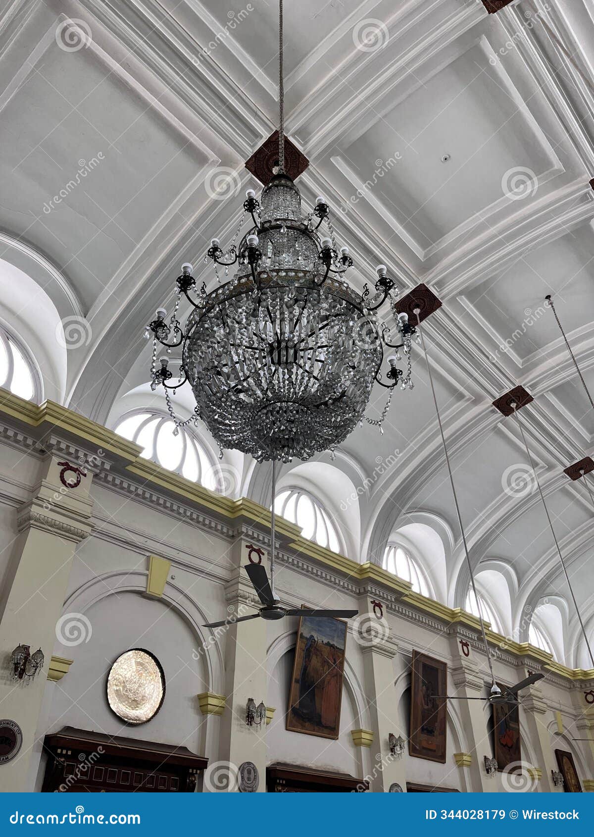 Elegant Chandelier Hanging from a Vaulted Ceiling in a Building ...