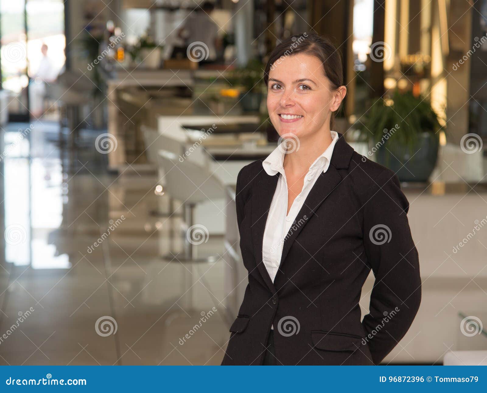 Elegant and Cheerful Woman Receptionist Stock Photo - Image of ...