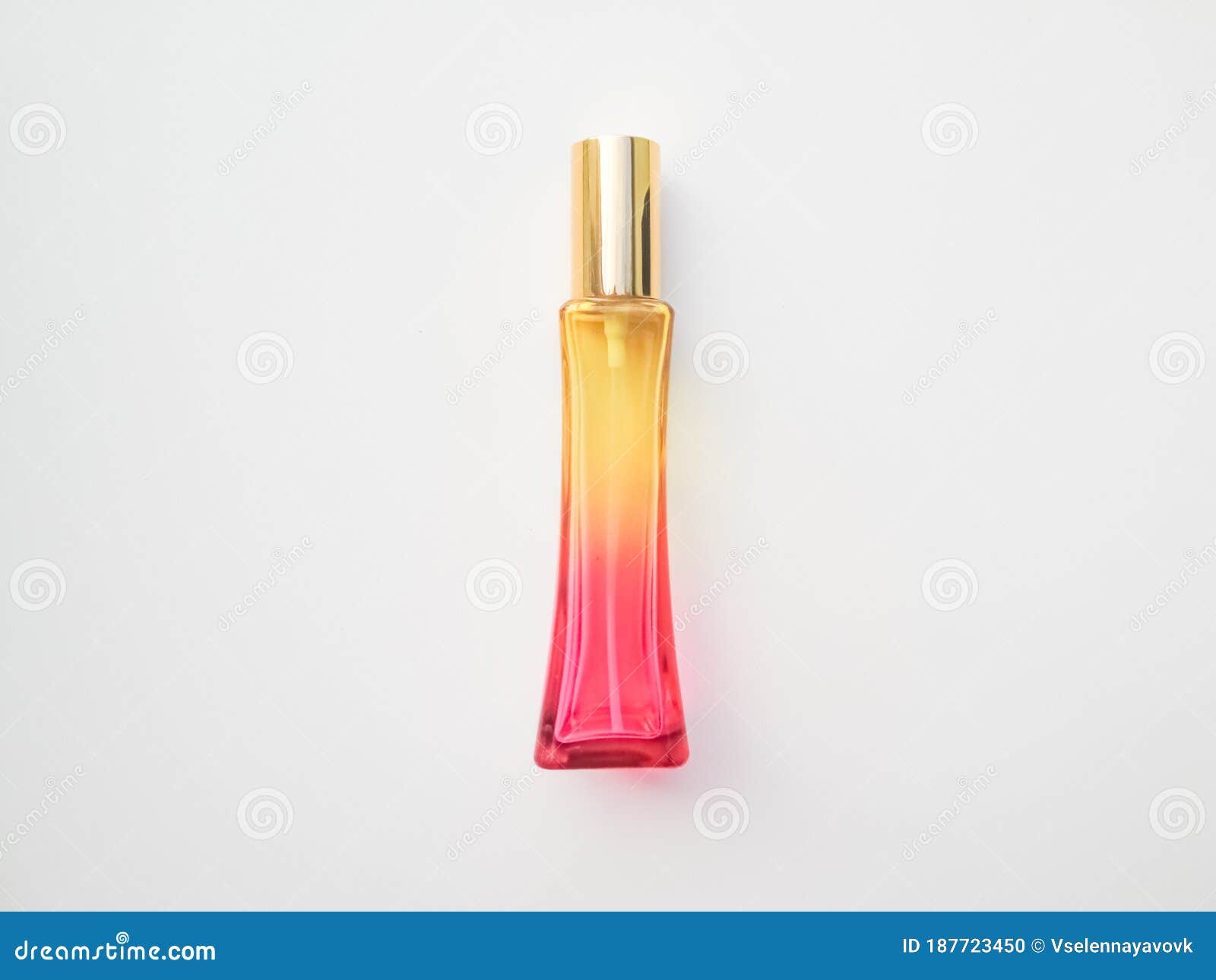 Elegant Colored Pink with Yellow Rectangular Perfume Bottle. Cosmetic ...