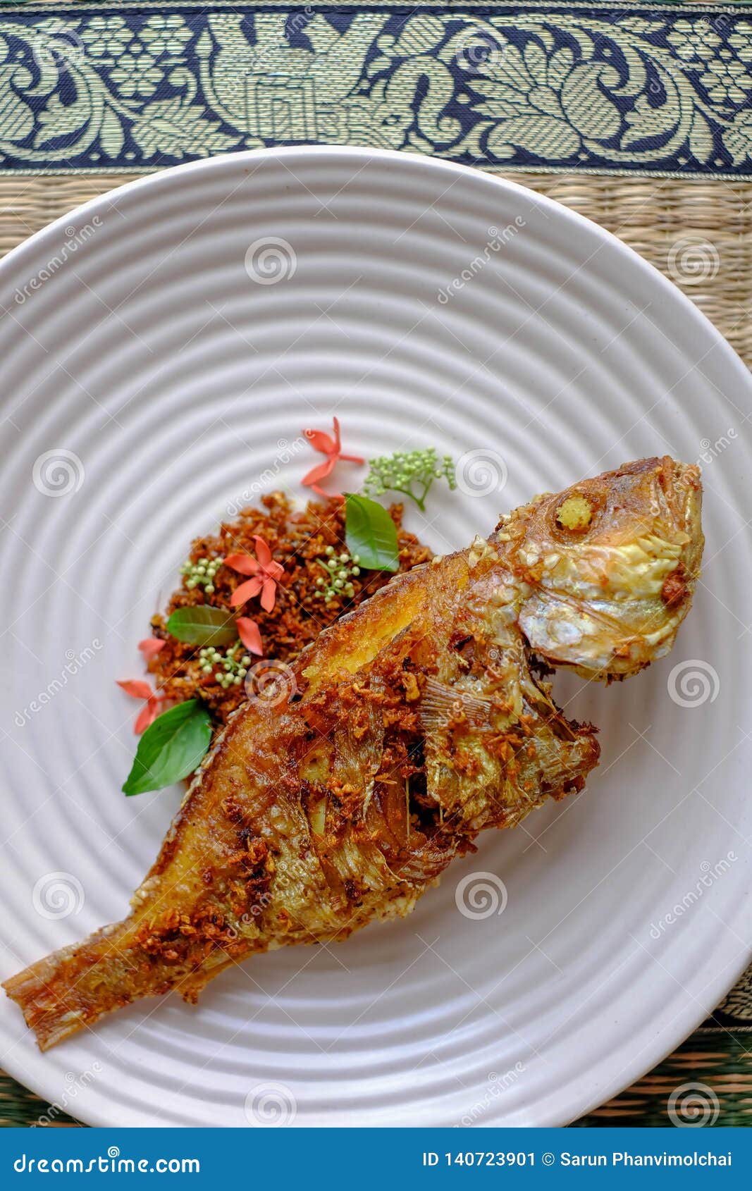 Elegant Deep Fried Fish with Herb and Flower on the Plate Stock Image ...