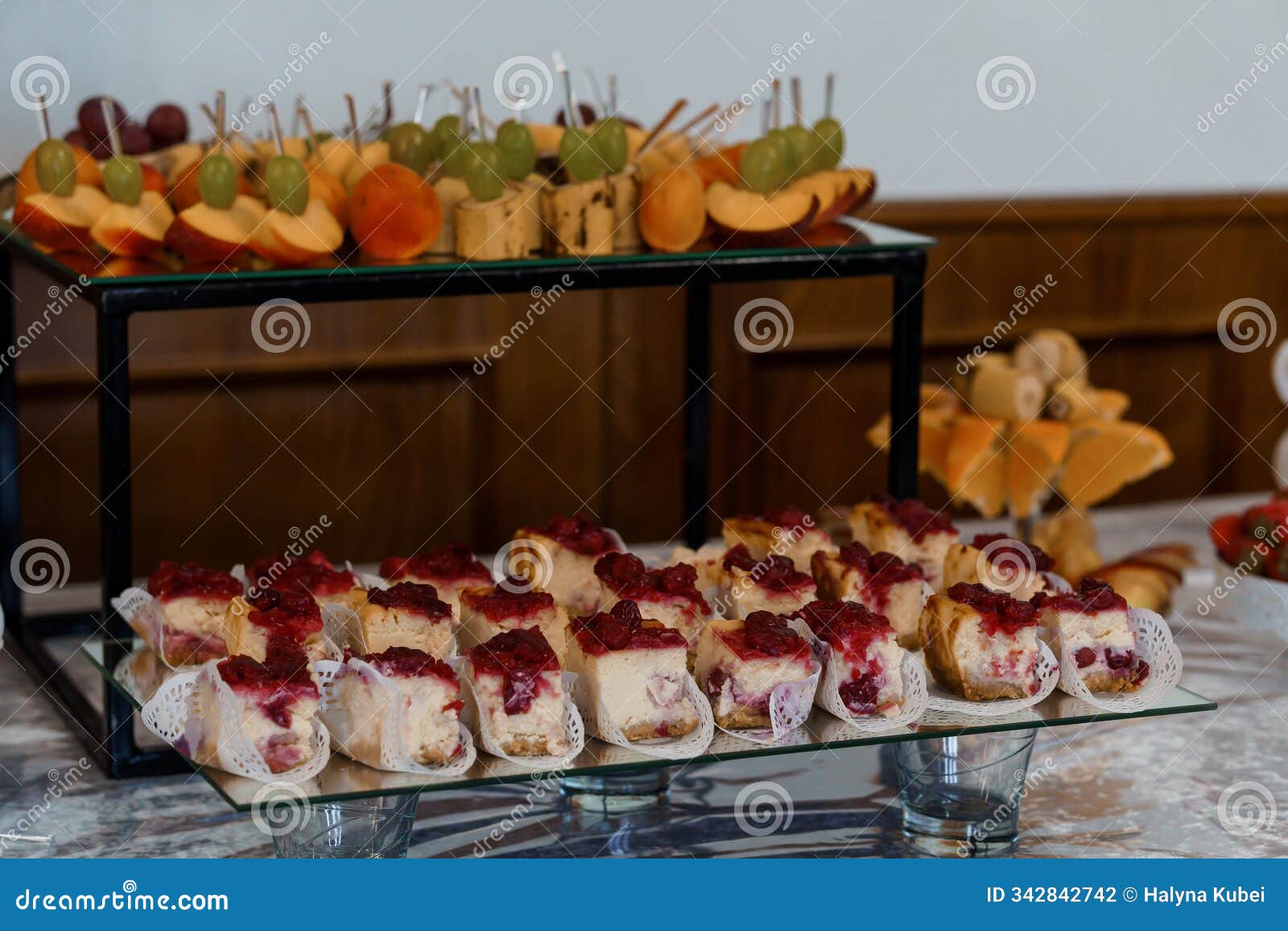 Elegant Display of Assorted Pastries and Fresh Fruits at a Buffet Stock ...