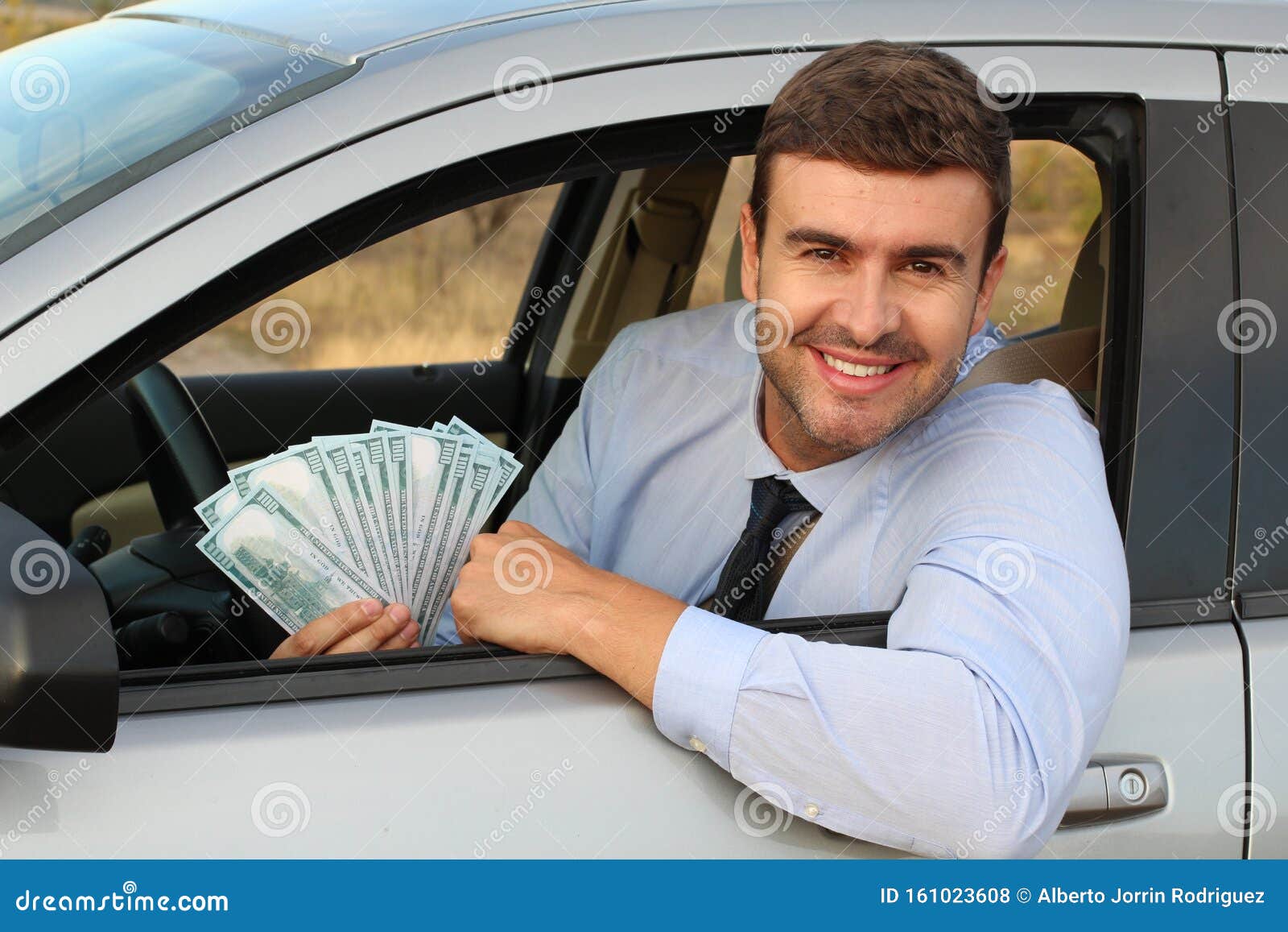 Elegant Driver Holding Lots of Dollars Stock Photo - Image of banking ...