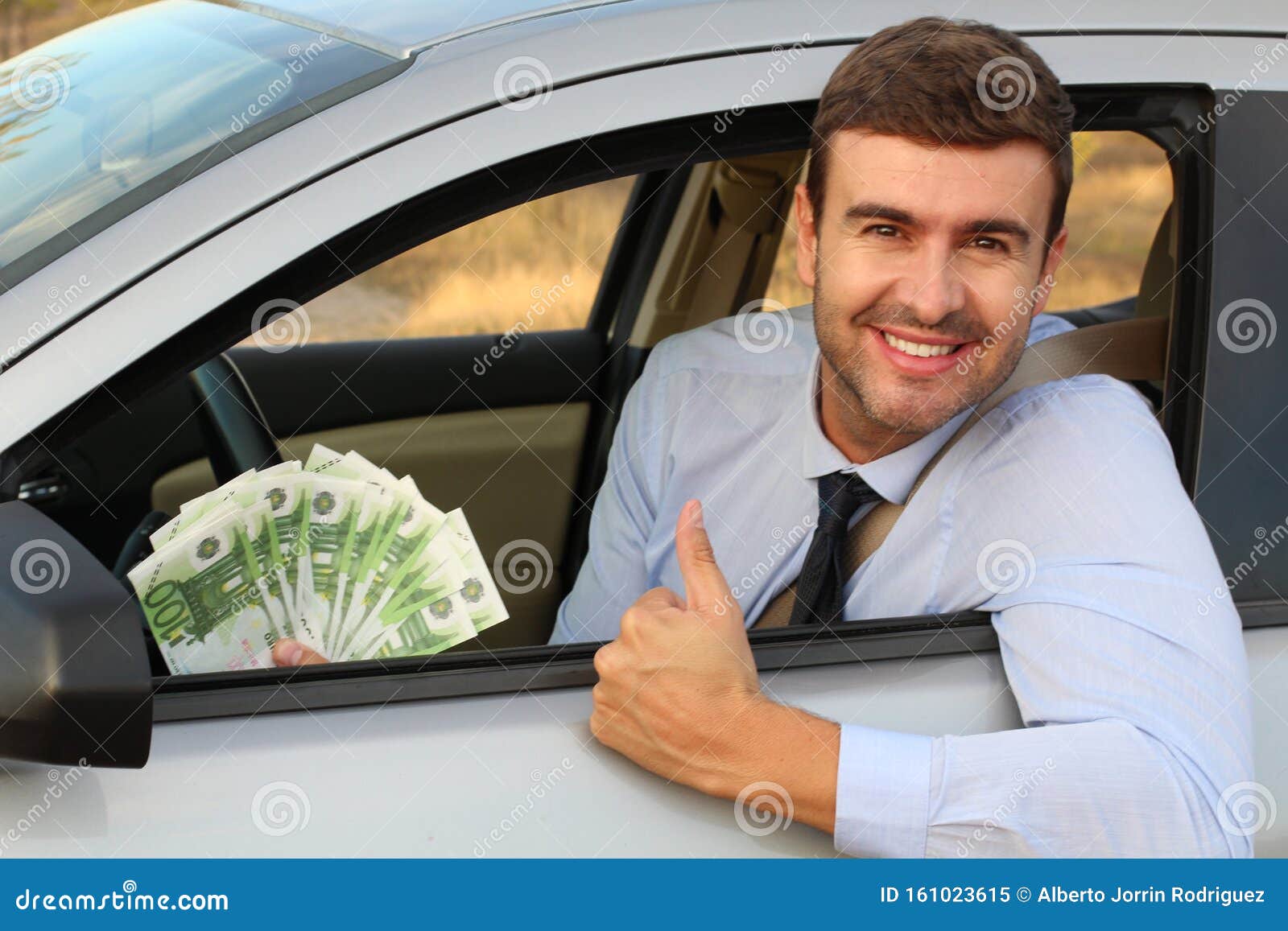Elegant Driver Holding Lots of Money Stock Image - Image of deal, bill ...