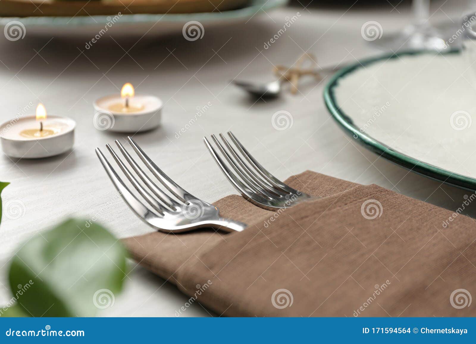 Elegant Forks with Napkin on Table. Festive Setting Stock Photo - Image ...