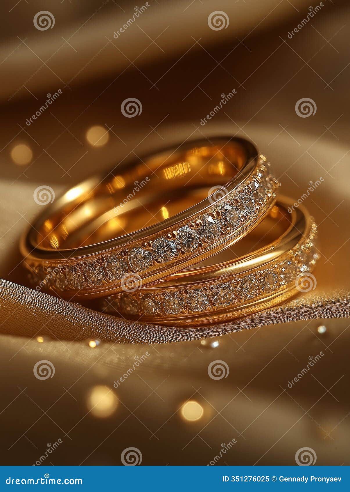 Elegant Gold Diamond Rings on Smooth Satin Background Highlighting ...