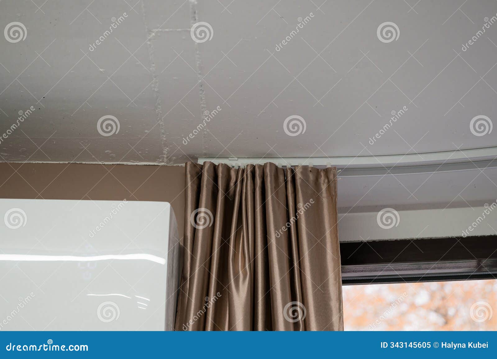 Elegant Interior with Light Brown Drapes and Modern Design Elements ...