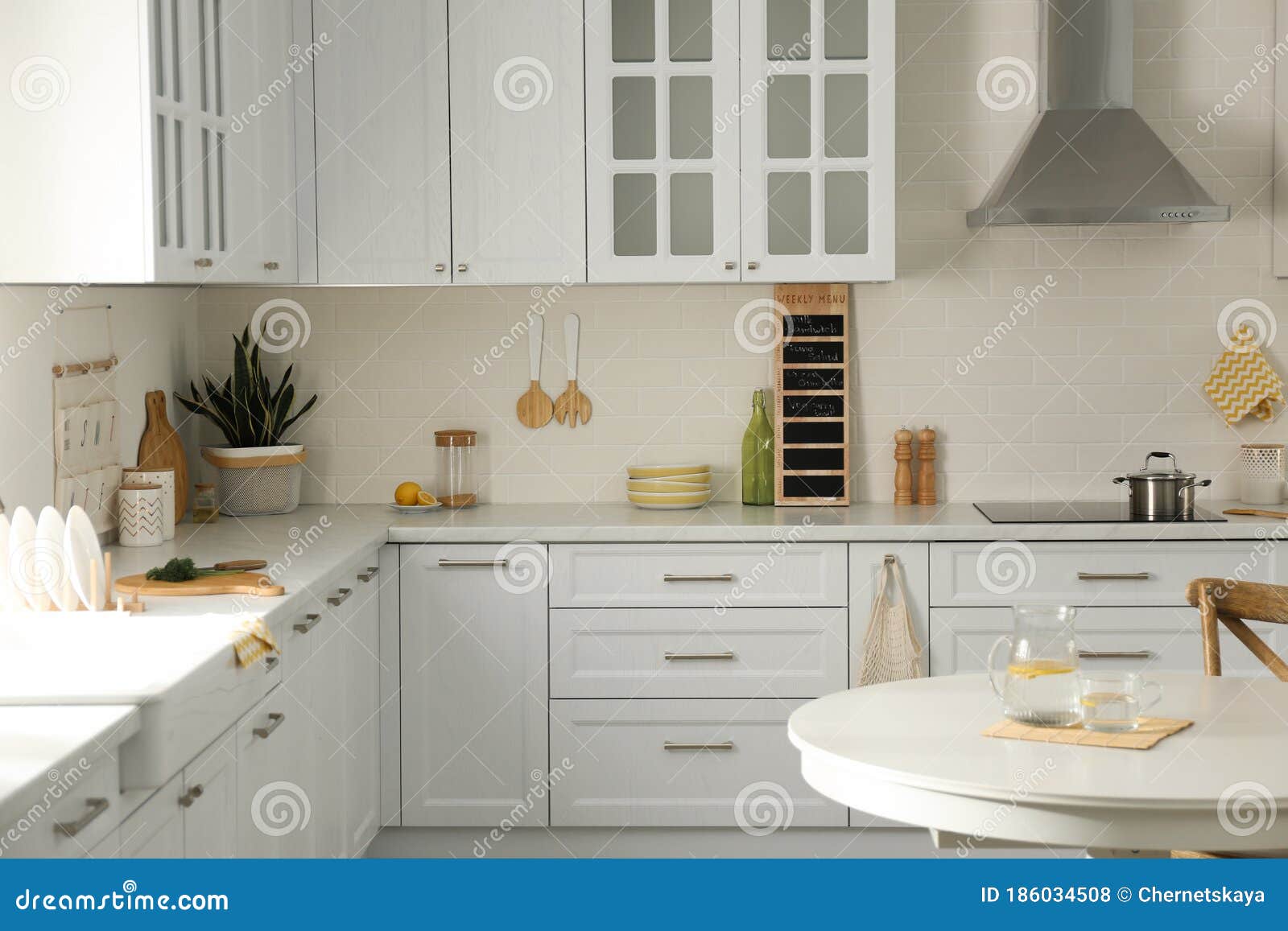 Kitchen Interior Design with White Round Table Stock Photo - Image of ...