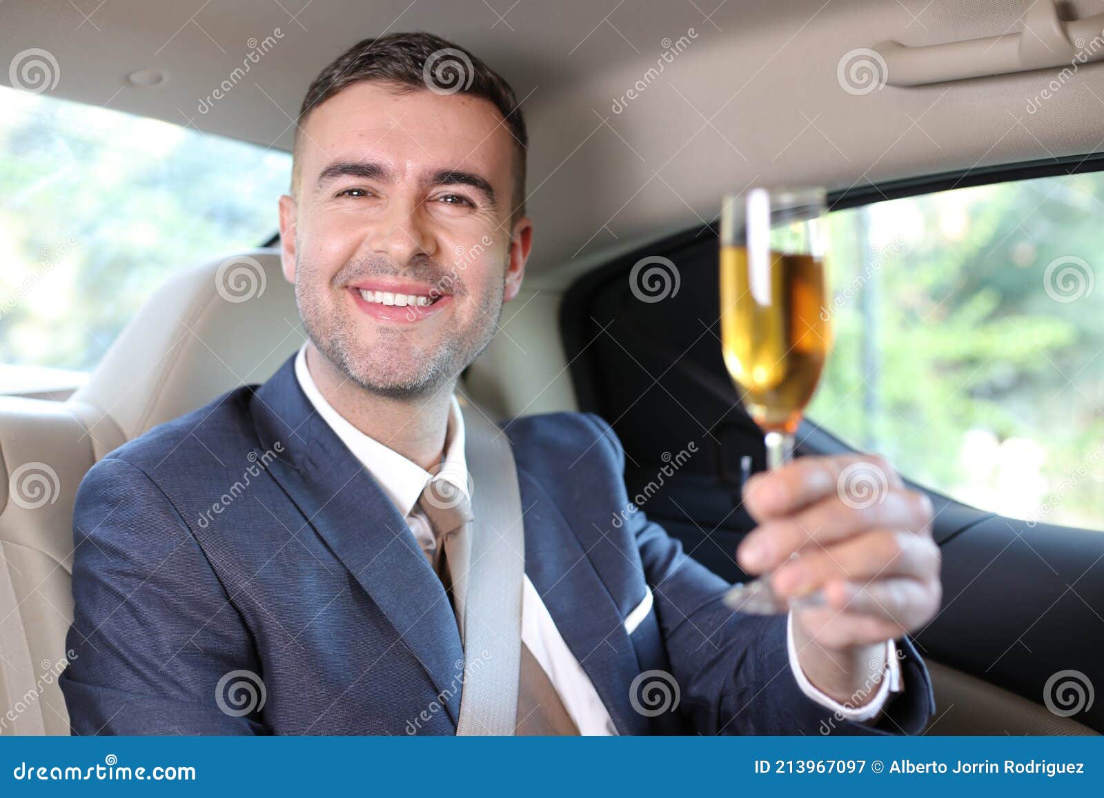Elegant Man Drinking Champagne in Limousine Stock Image - Image of ...