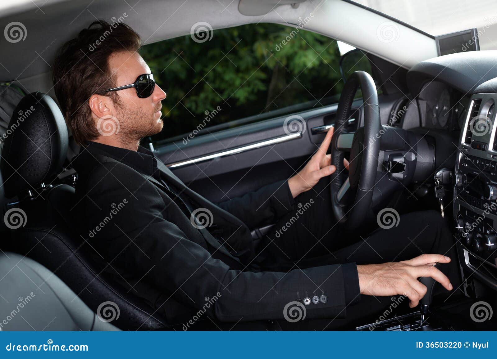 Elegant man driving a car stock photo. Image of elegant - 36503220