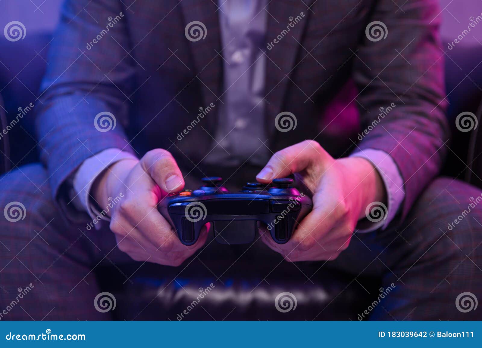 Elegant Man Holds Gaming Controller Stock Photo - Image of plays ...
