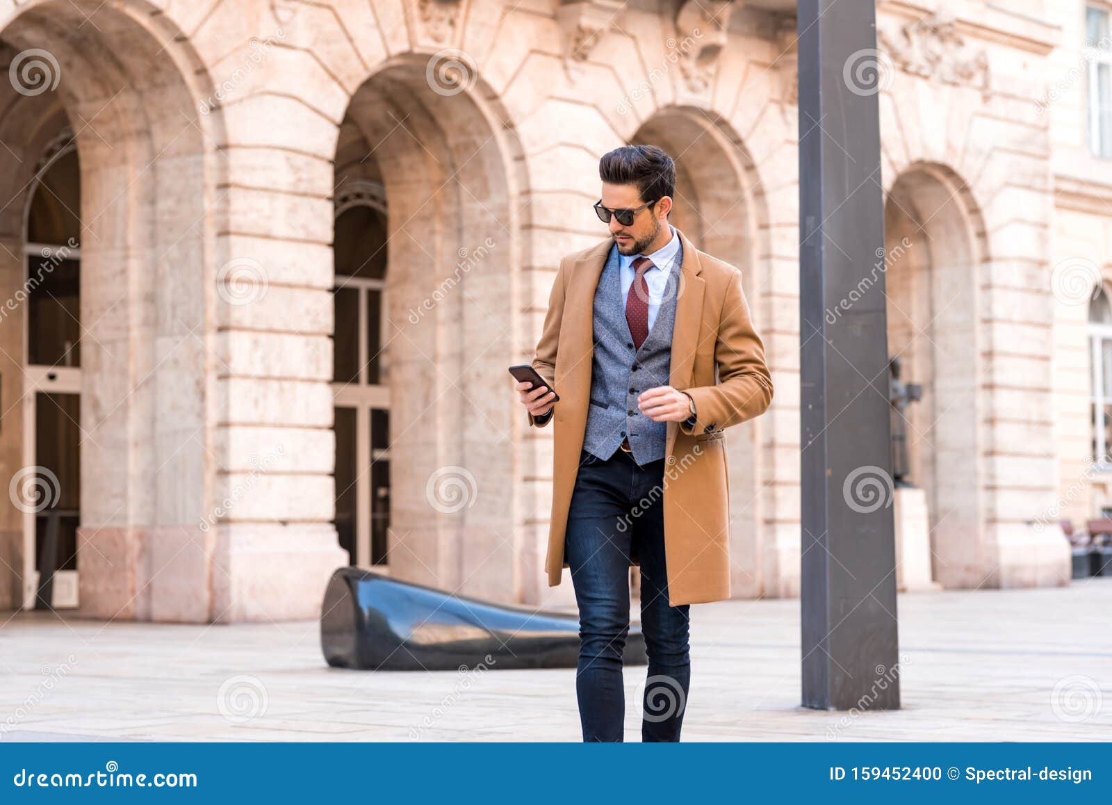 An Elegant Man on a Square Using His Smartphone Stock Photo - Image of ...