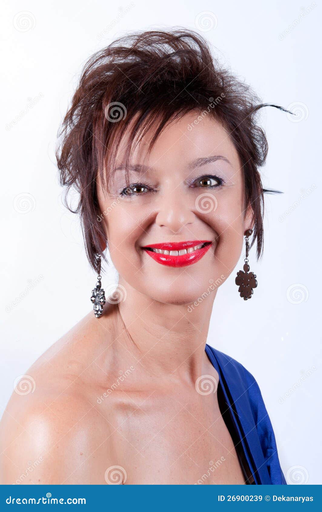 Elegant Middle Aged Woman With Hoary Hair Poses On Light Background ...