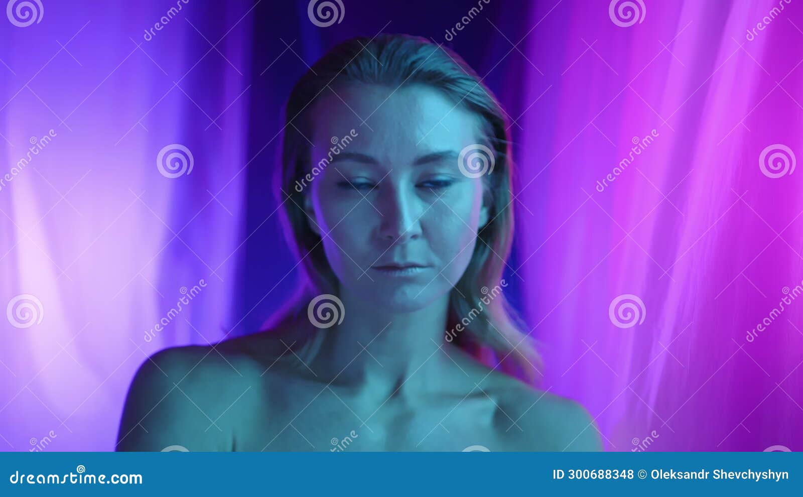 Elegant Model with Light Playing Colourful Patterns on Face and ...