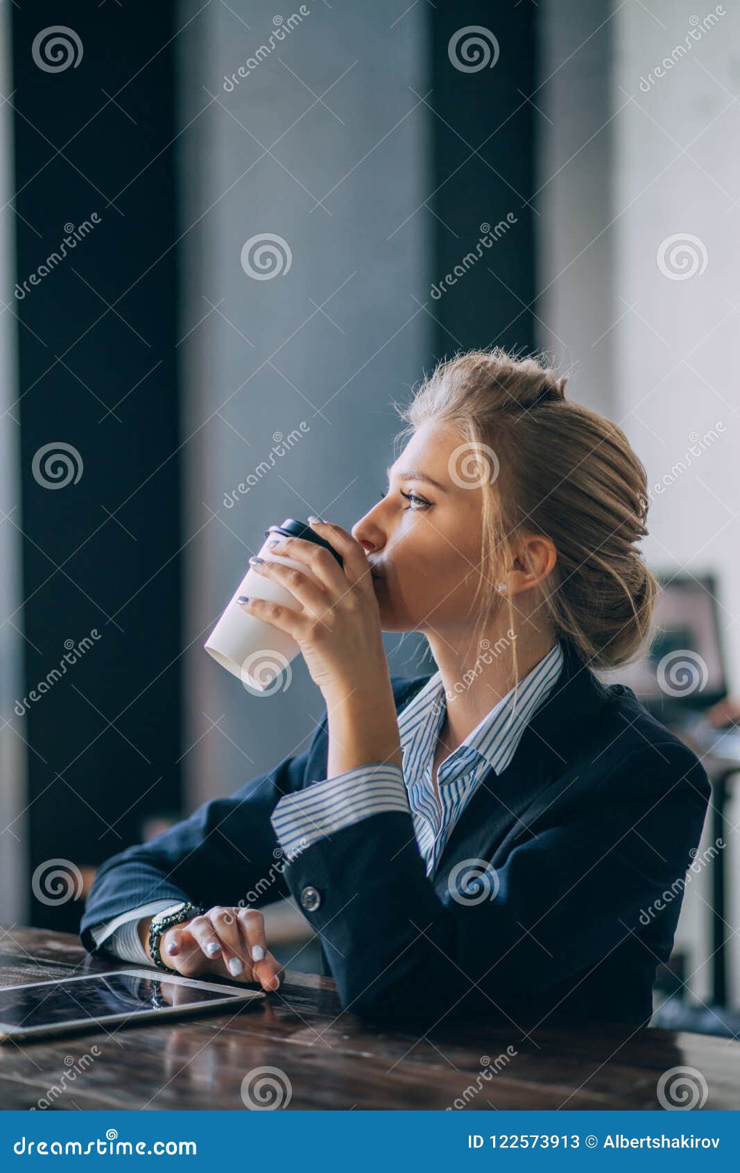 Elegant Office Worker Drinking Tea at the Cafe with Modern Interior ...