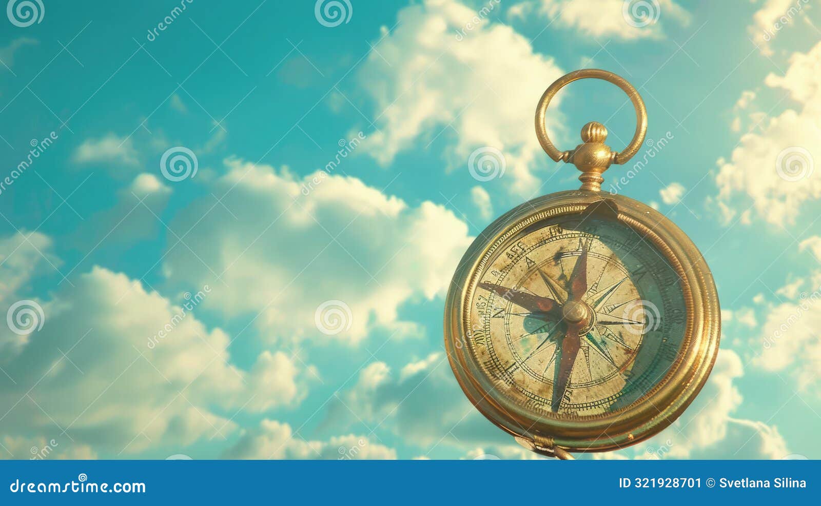 Elegant Old Compass on a Serene Sky Blue Background, Ideal for Creative ...