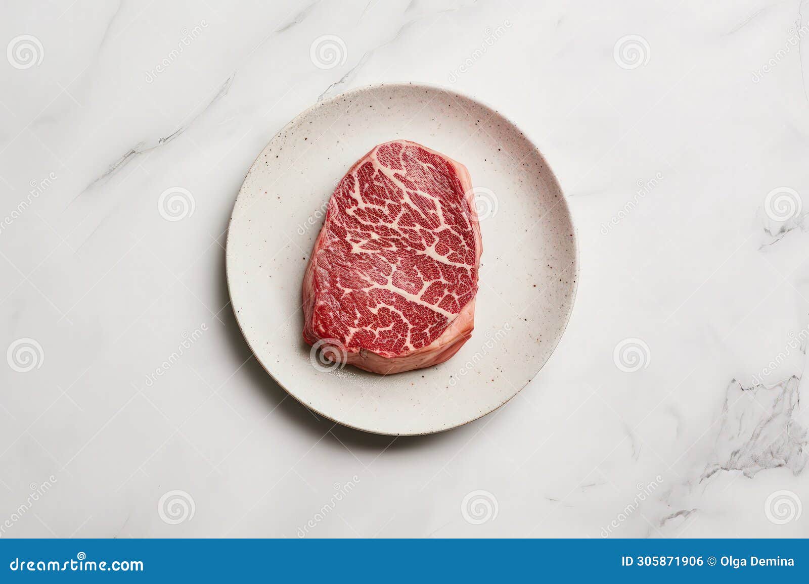 Elegant Plating of a Wagyu Beef Steak Against a Marbled White Backdrop ...
