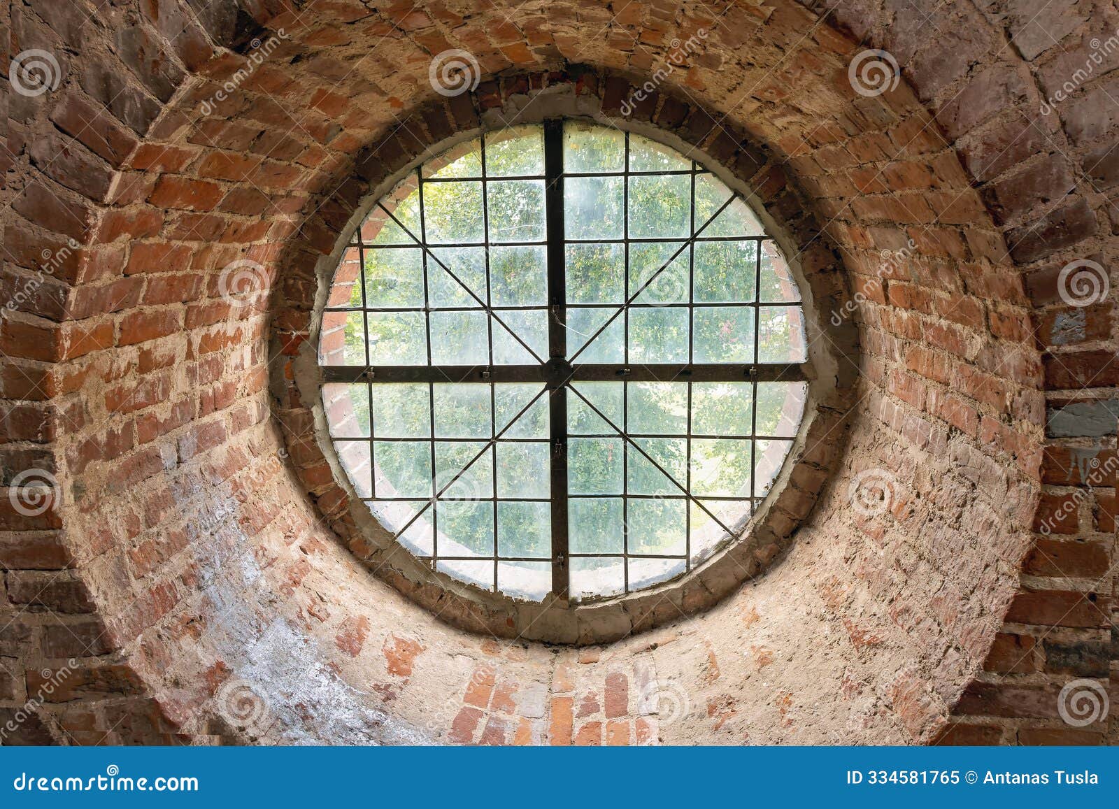Elegant Round Window Featuring a Glass Grid Design Set within a Classic ...