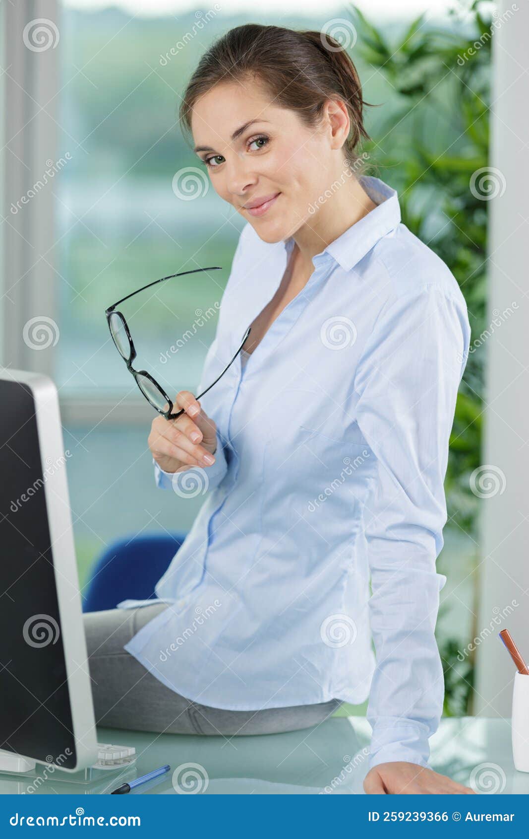 Elegant Secretary Sat on Office Desk Stock Photo - Image of secretary ...