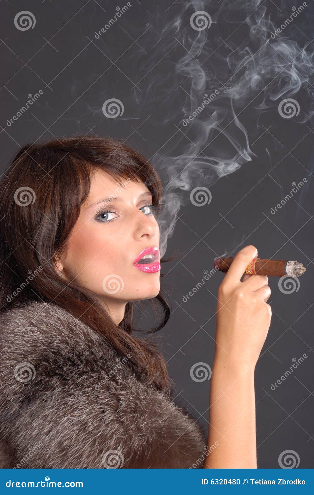 Elegant smoking woman stock photo. Image of cocky, face - 6320480