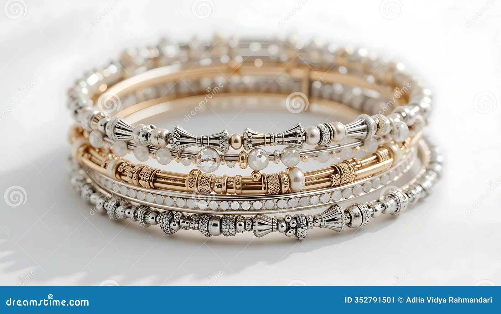 Elegant Stack of Gold and Silver Beaded Bangles Stock Illustration ...