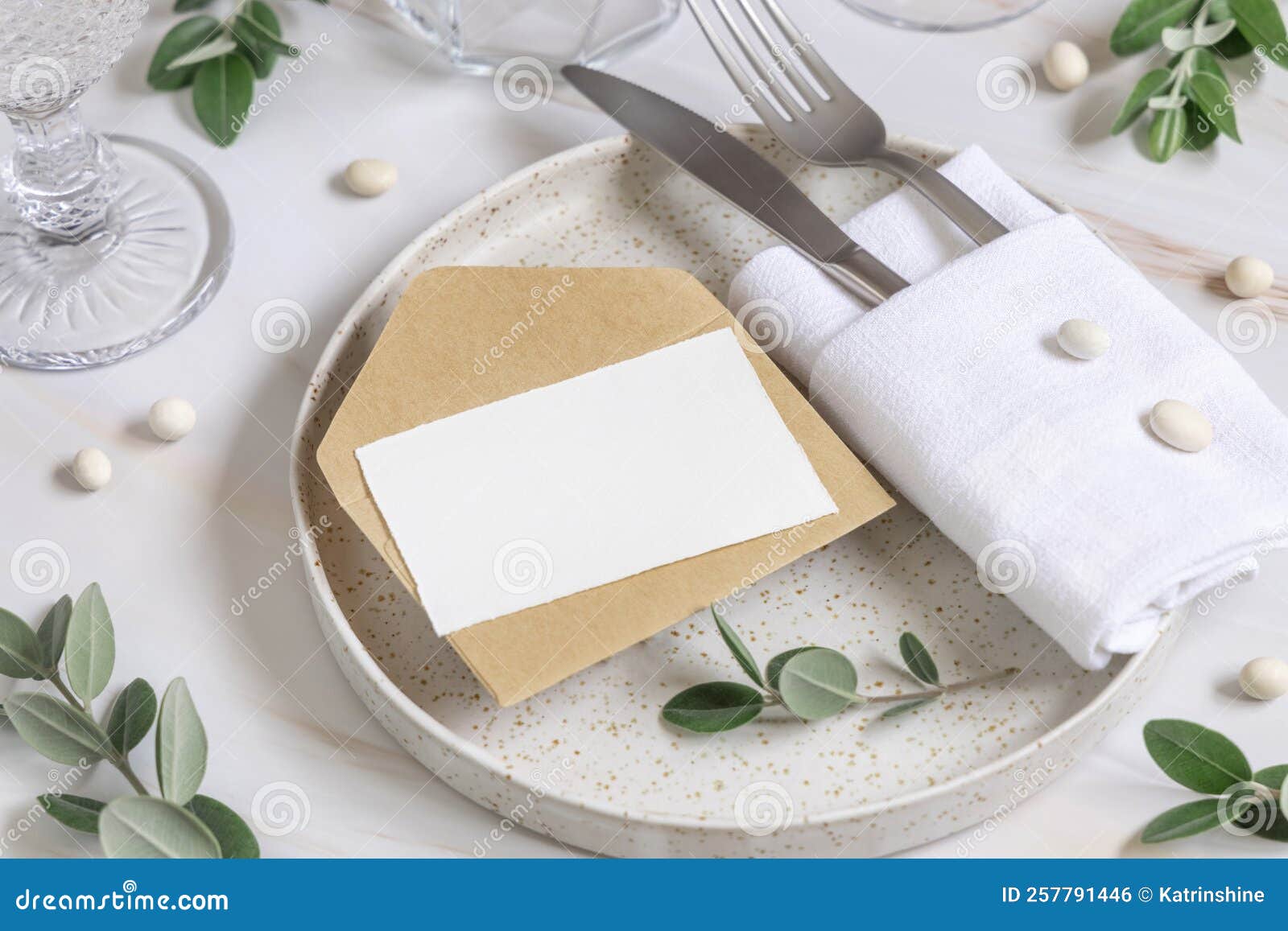 Elegant Table Setting with a Card Decorated with Eucalyptus Branches ...