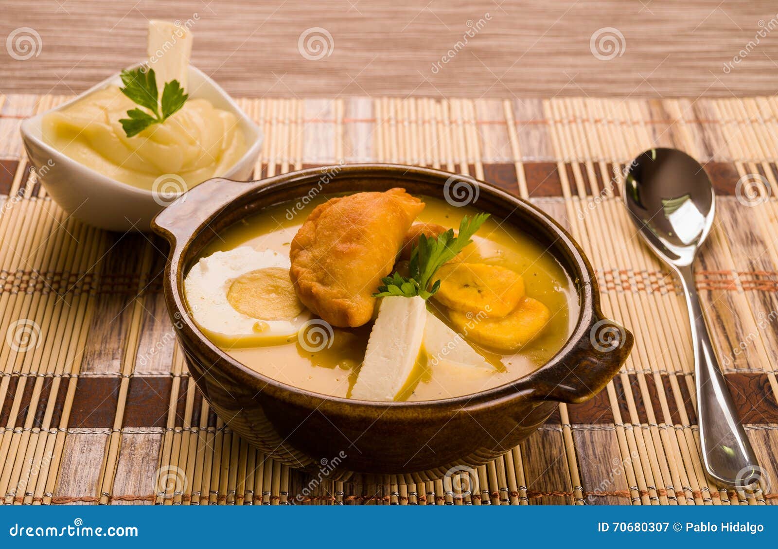 Elegant Table Setting with Full Serving of Traditional Fanesca Soup and ...