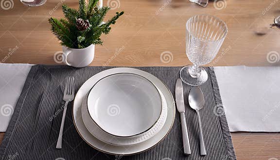 Elegant Table Setting: White Dinnerware, Minimalist Decor Stock ...