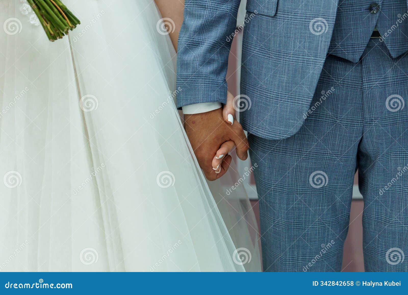 Elegant Wedding Couple Holding Hands in Romantic Setting Stock Photo ...