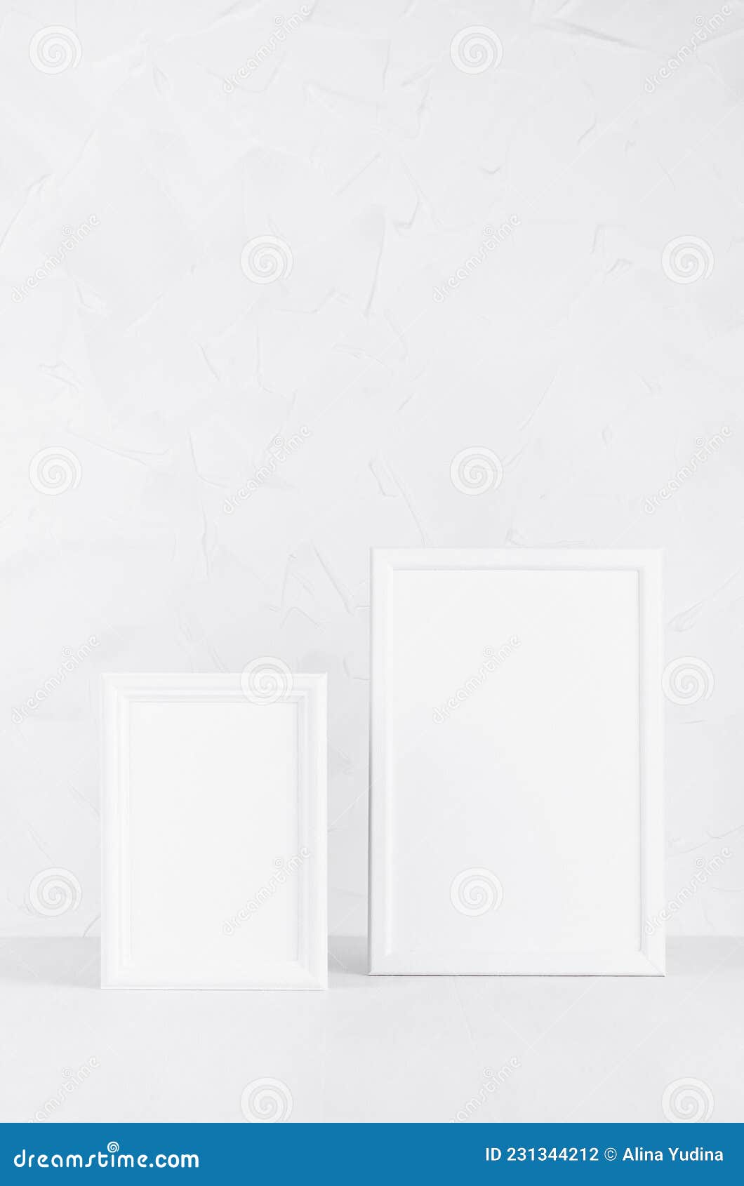 Elegant White Empty Rectangle Photo Frames Standing on White Wood Table ...