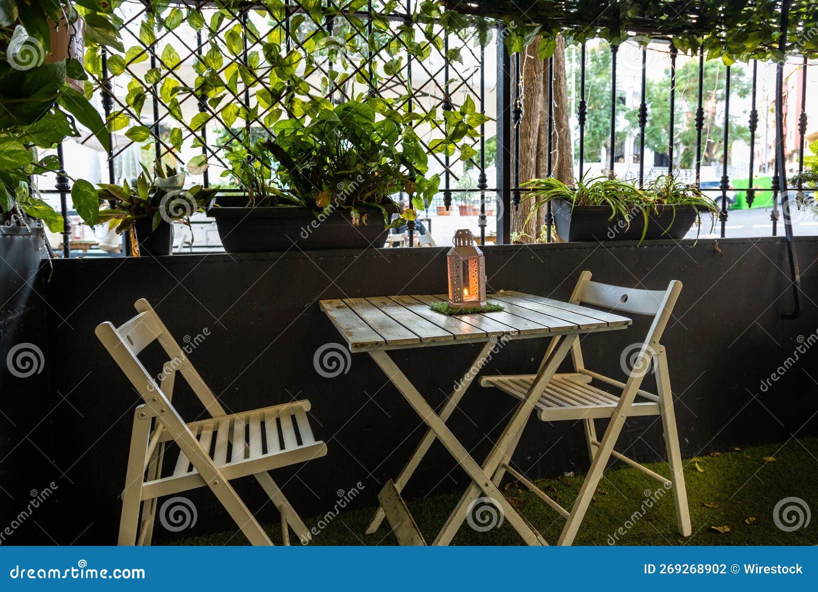 Elegant White Lantern on a Wooden Table in a Restaurant Stock Photo ...