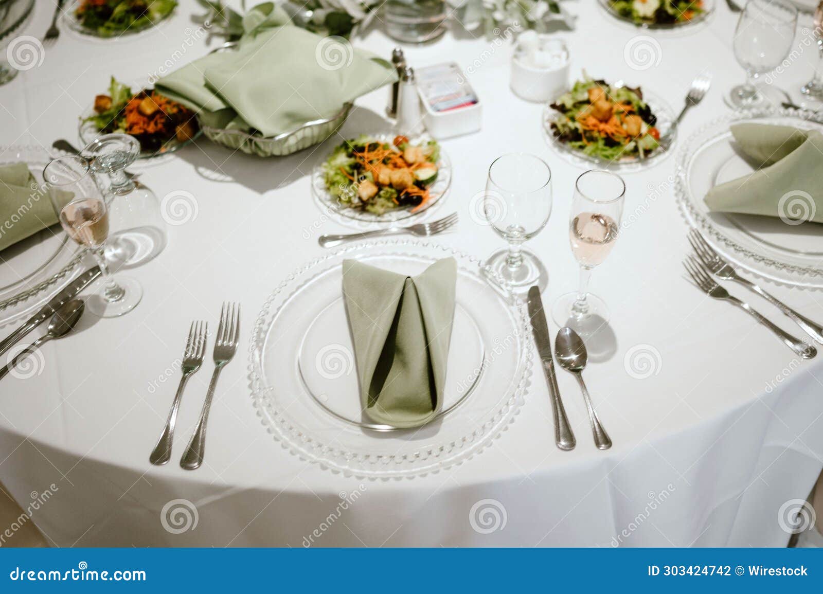 Elegant White Table Setting for a Wedding Reception with Pristine ...