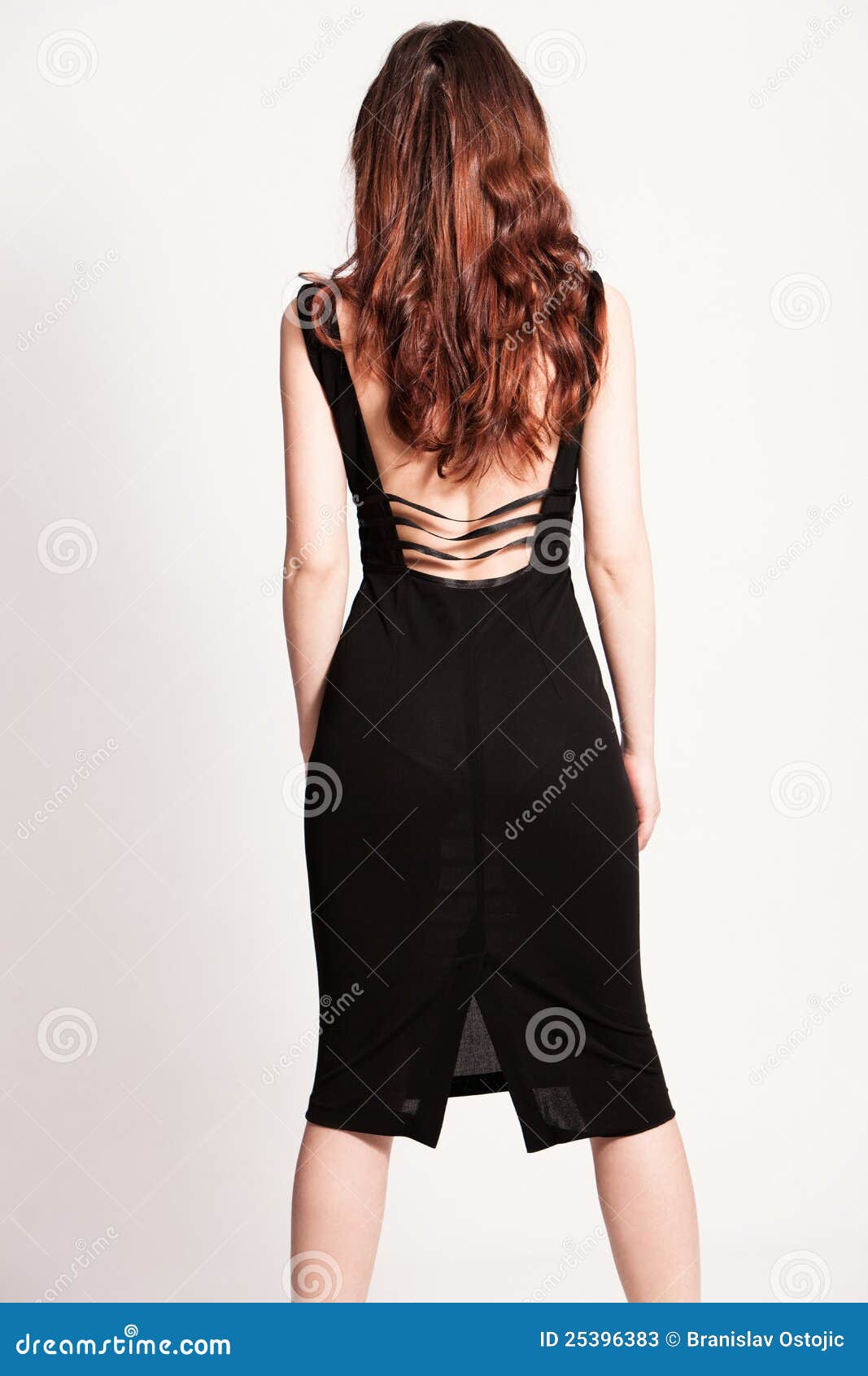 Back Wiev Of Beautiful Strong Muscular Woman Showing Her Biceps And Arm ...