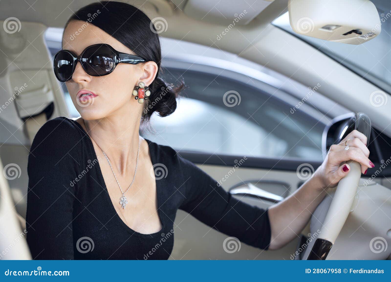 Elegant Woman with Long Legs in Car Stock Photo - Image of makeup ...
