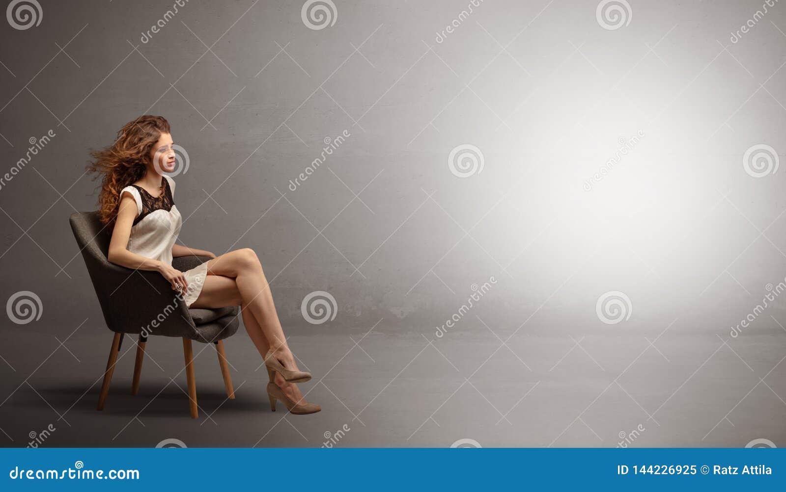 Elegant Woman Modeling in an Empty Studio Stock Image - Image of curly ...
