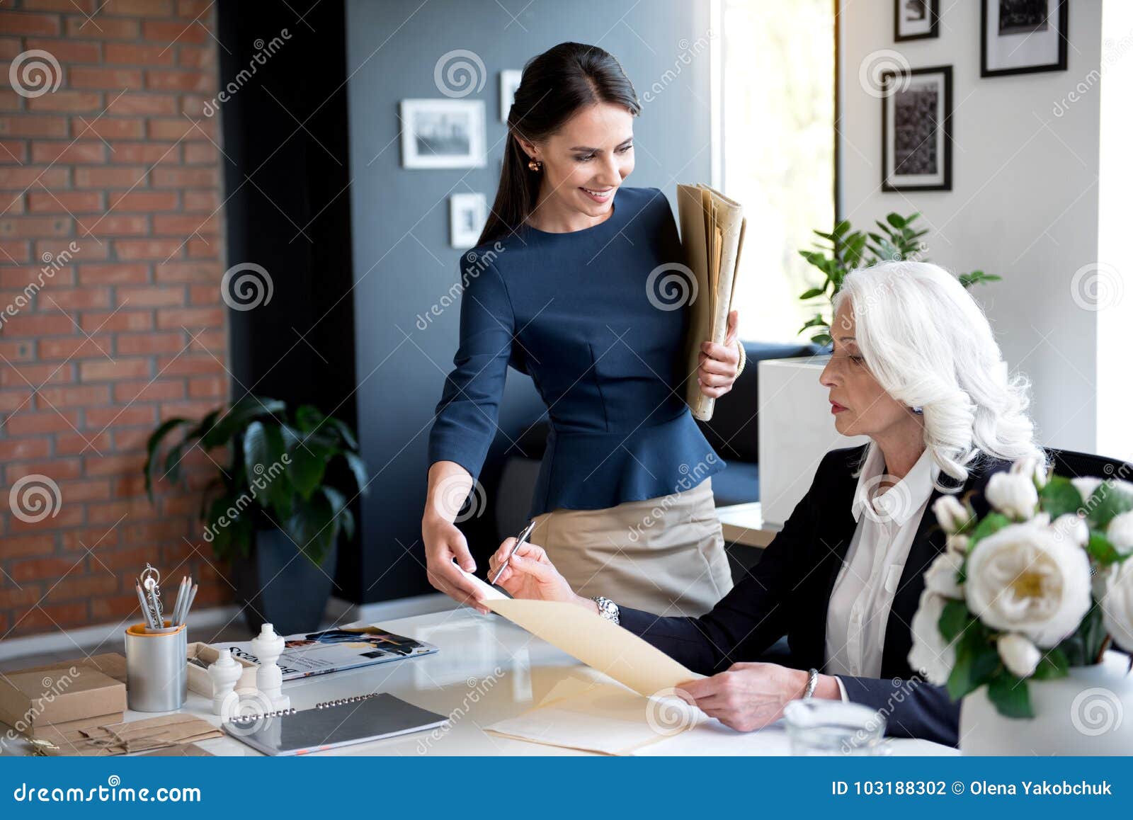 Elegant Women are Laboring Together Stock Photo - Image of envelope ...